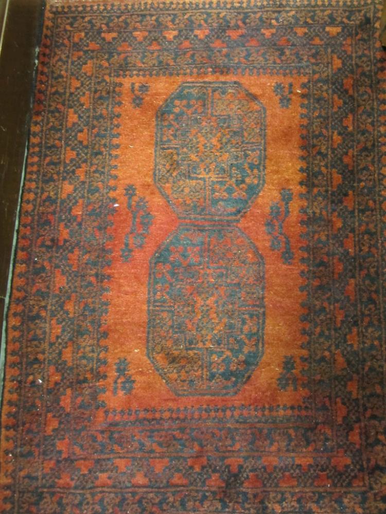 Lot 1 - Four small wool rugs