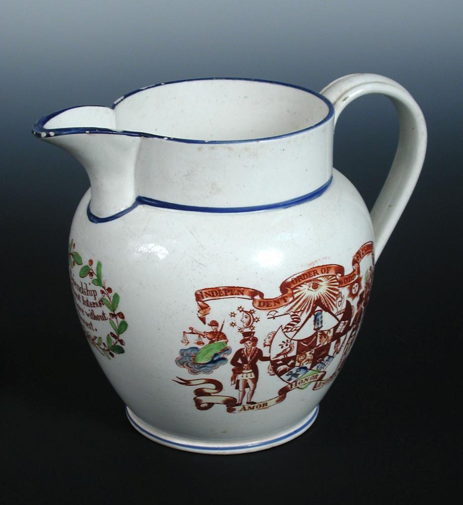 Lot 9 - An early 19th century creamware jug, printed