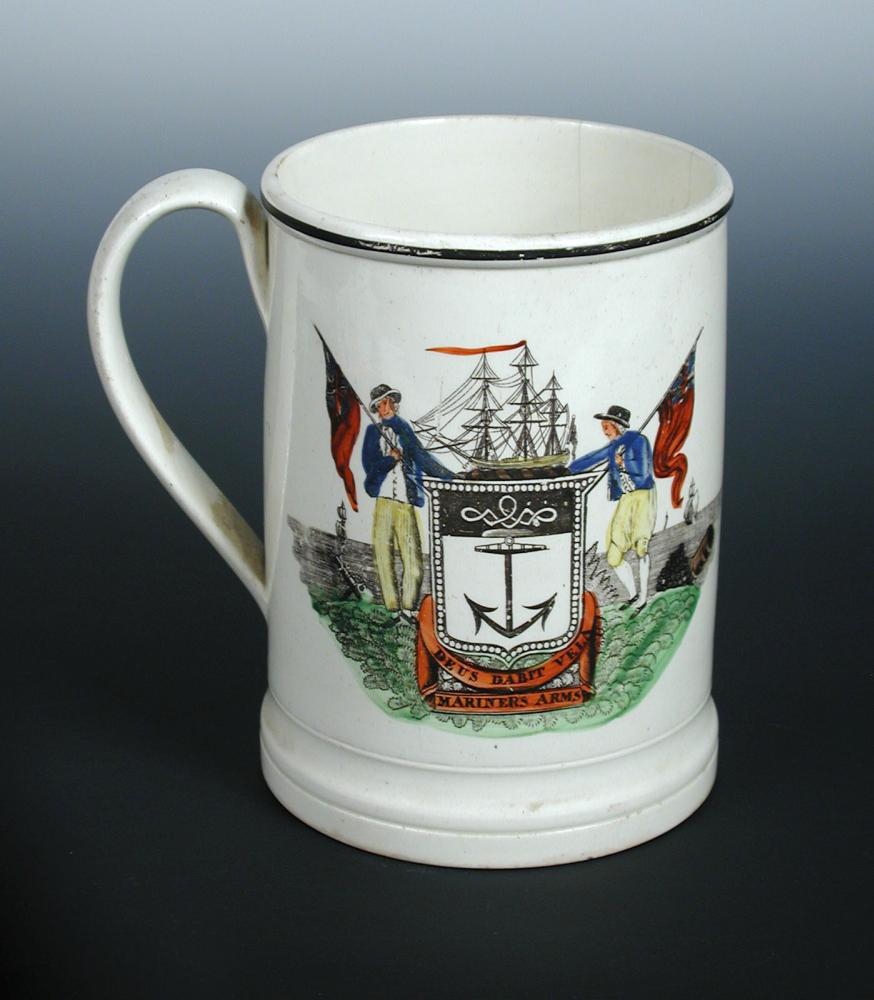 Lot 17 - An early 19th century creamware mug, possibly